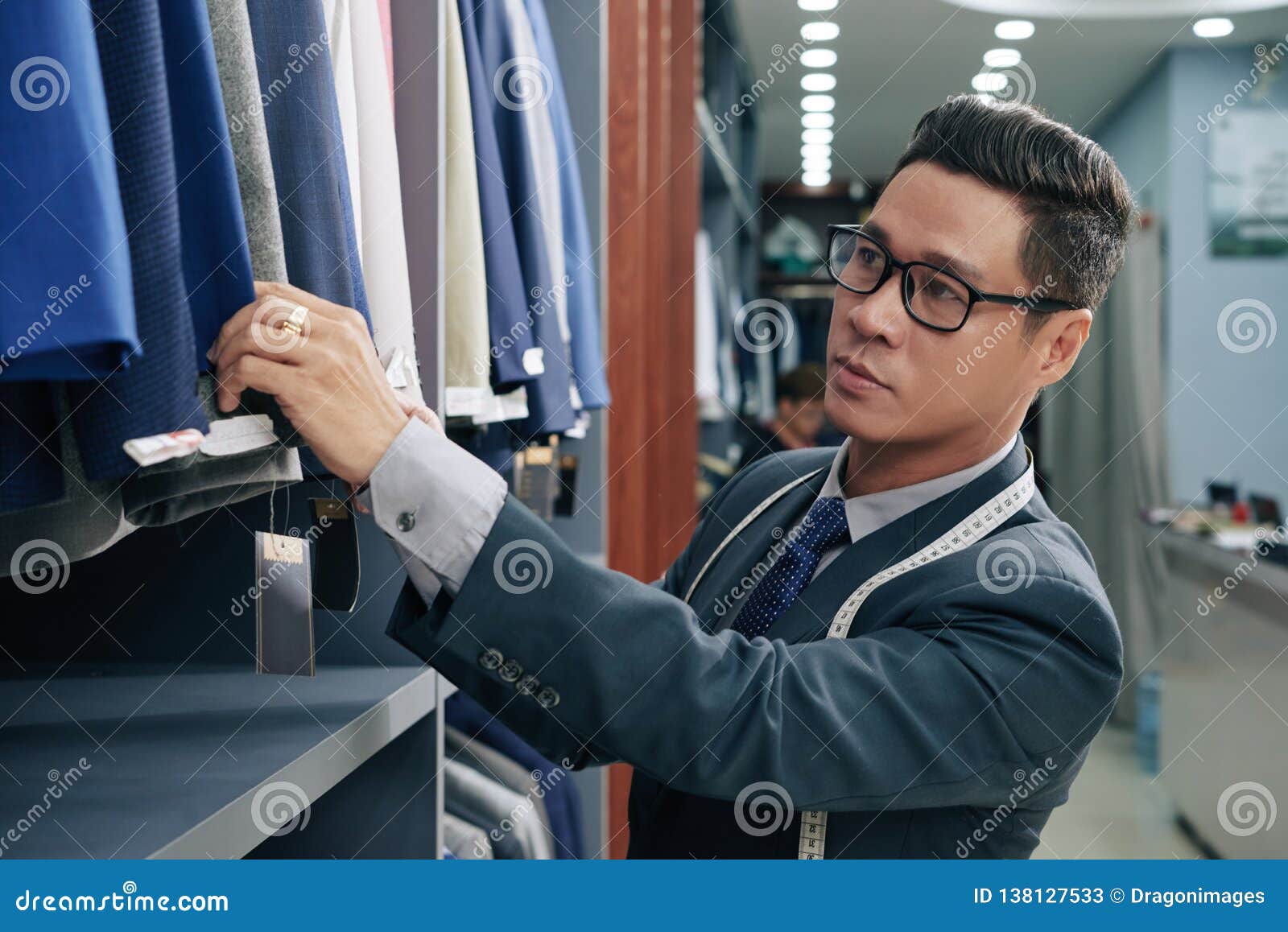 Shop Assistant Working in Store Stock Image - Image of couturier, store ...