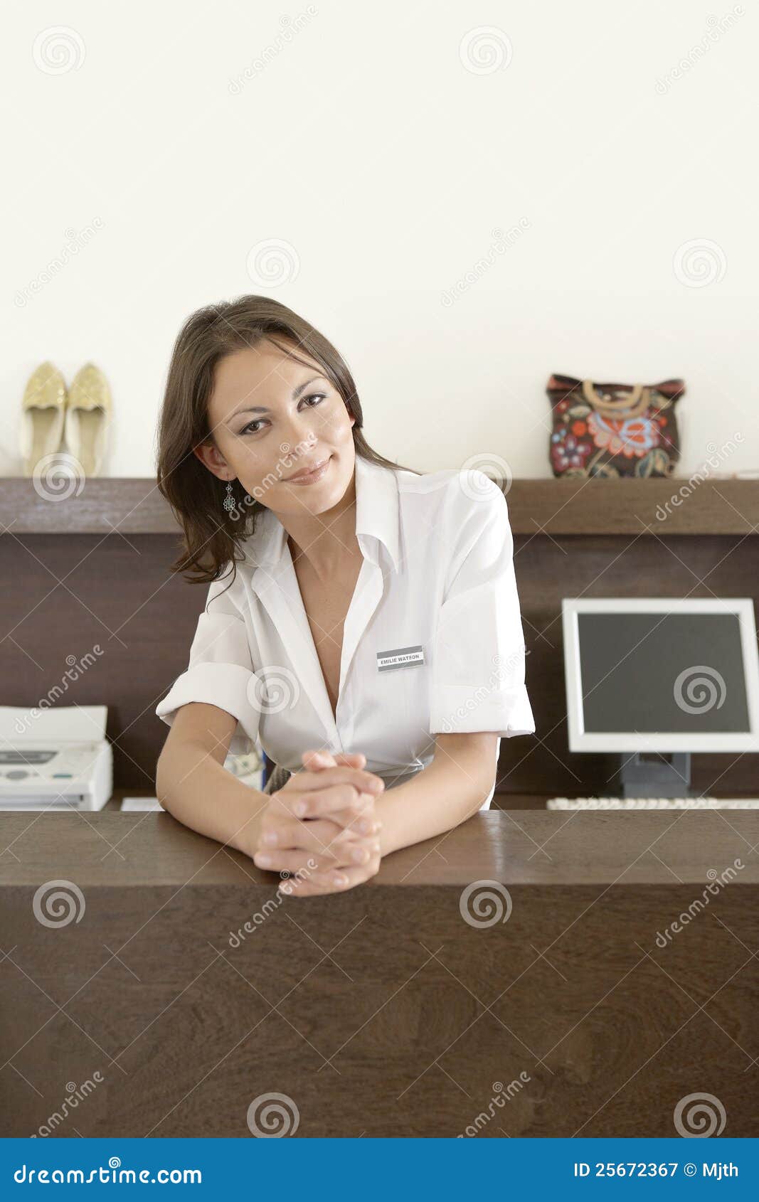 Shop Attendant at Counter stock image. Image of computer - 25672367
