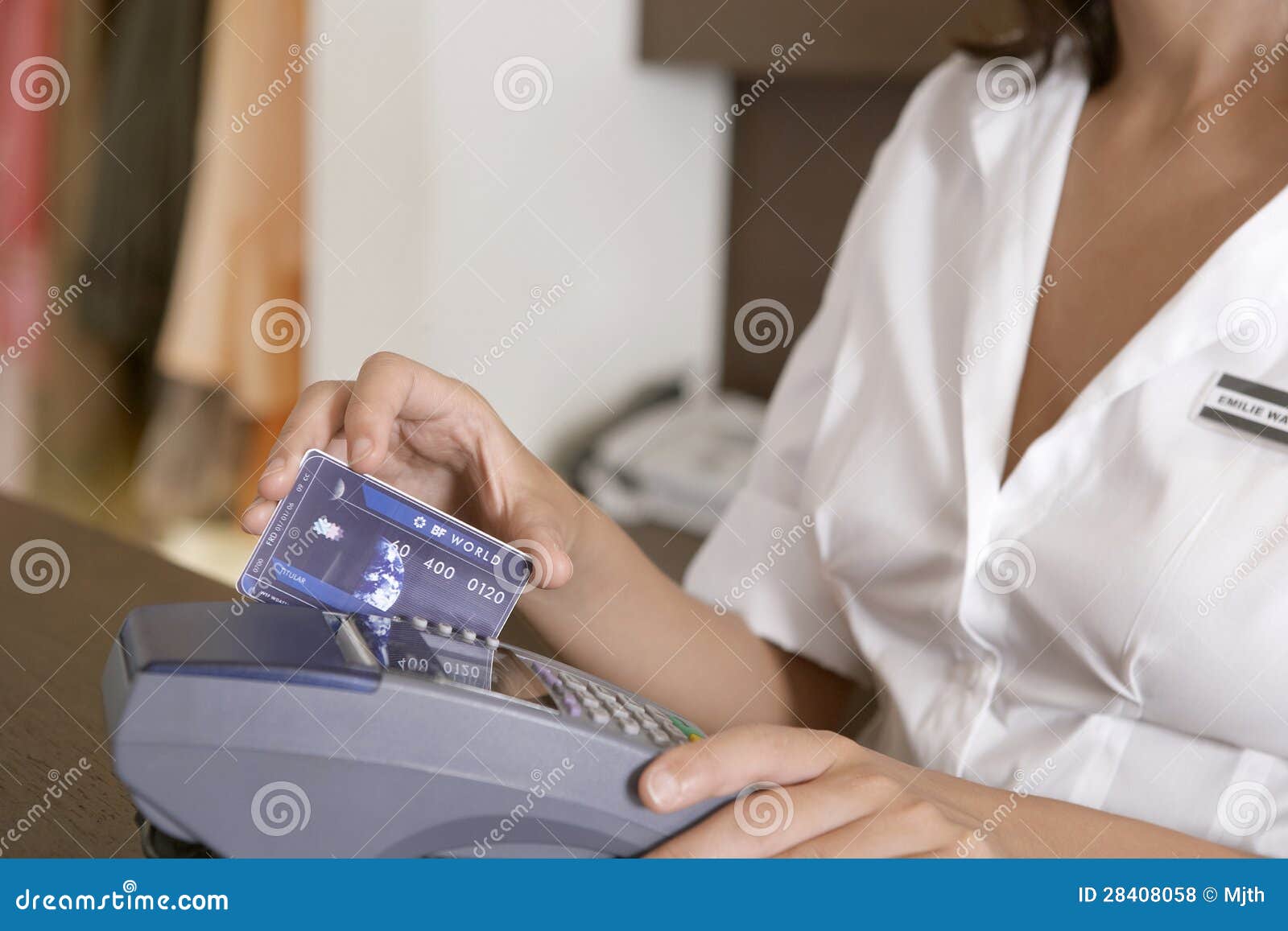 Shop Attendant Sweeping Credit Card at Store Counter Stock Photo ...