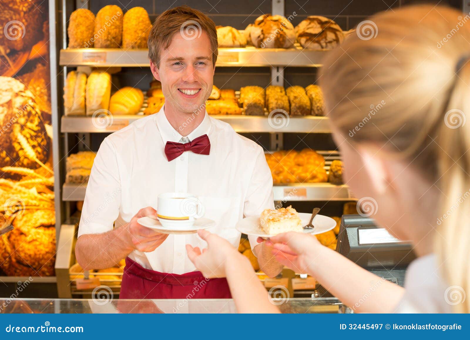 Shopkeeper in Cafe Giving Cup of Coffee To Client Stock Image - Image ...