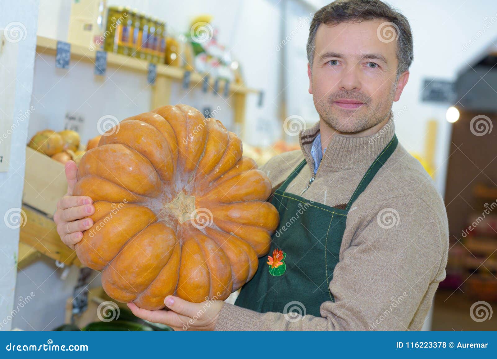 Shopkeeper Holding Large Squash Stock Photo - Image of greengrocer ...