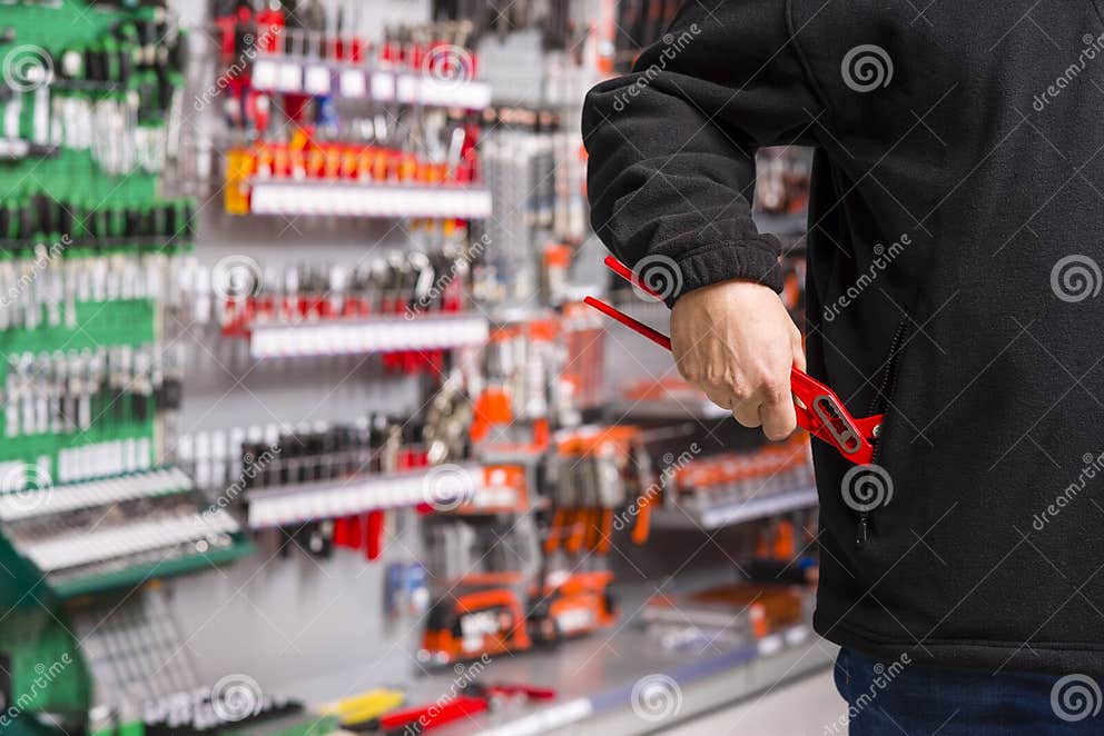 Shoplifter at work stock photo. Image of steal, shoplifting - 36182862
