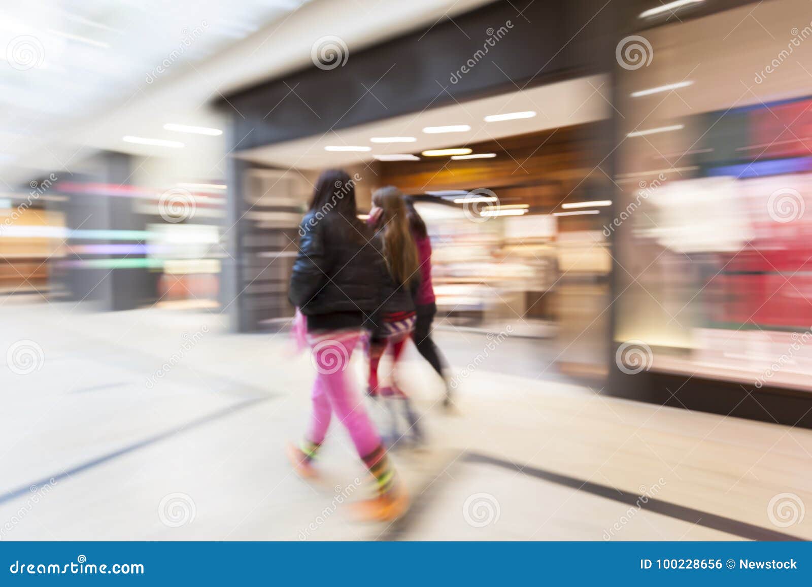 Shopper Walking in Front of Shop Window Editorial Photo - Image of ...