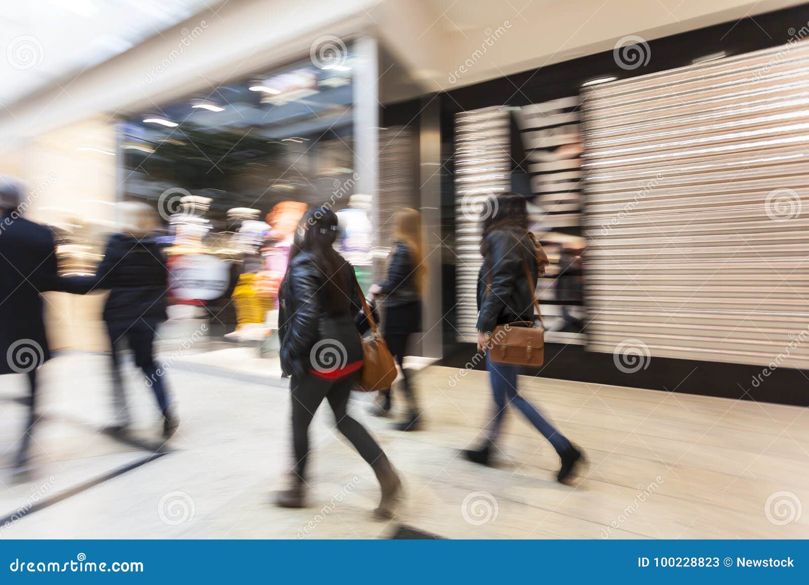 Shopper Walking in Front of Shop Window Editorial Stock Photo - Image ...
