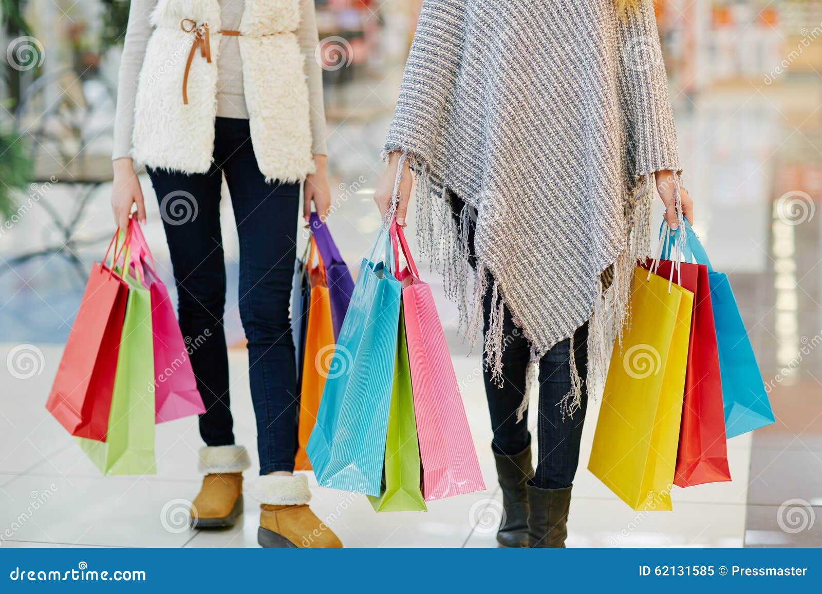 Shoppers with paperbags stock image. Image of women, offer - 62131585