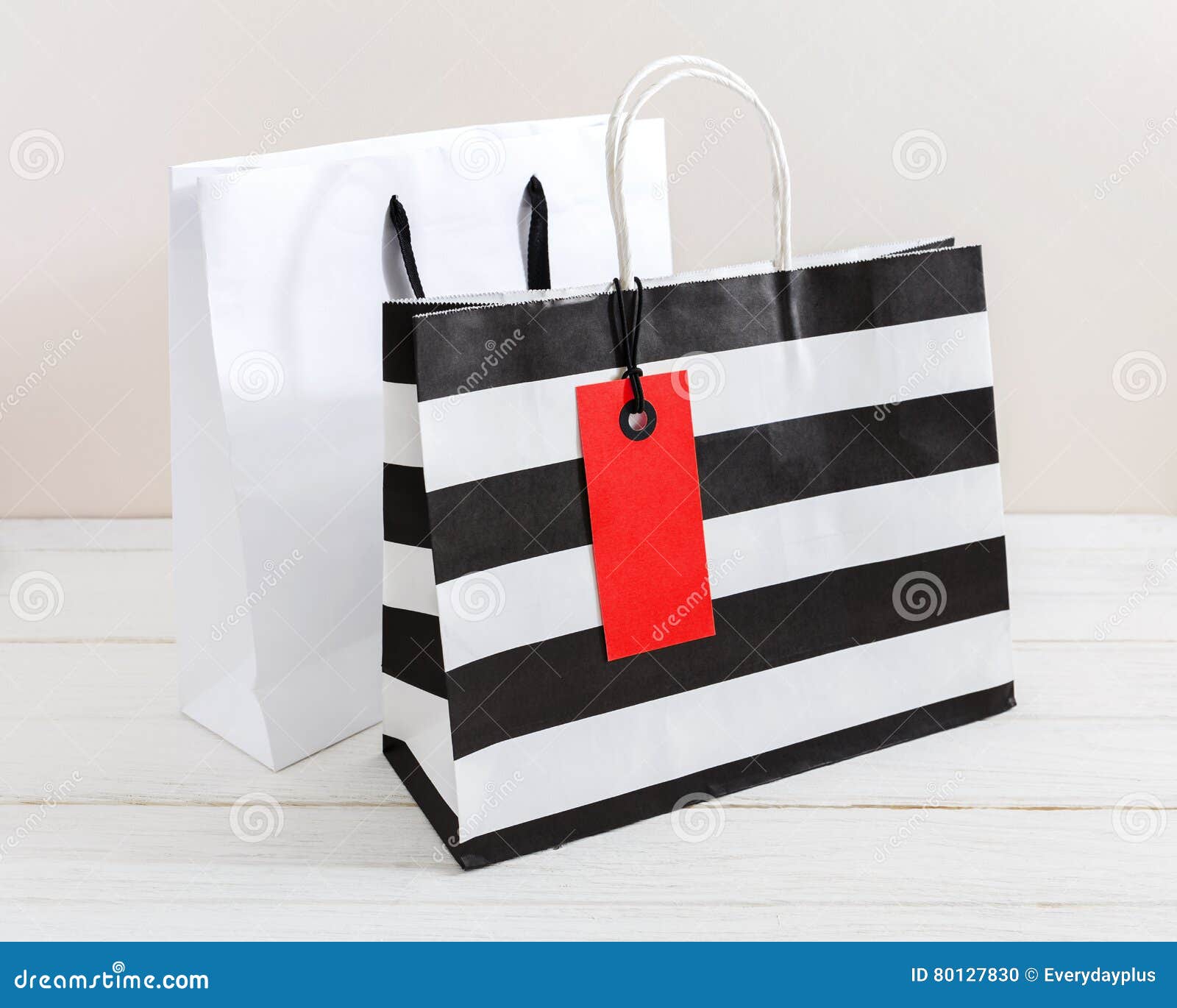 Shopping bag with red tag stock photo. Image of commercial - 80127830