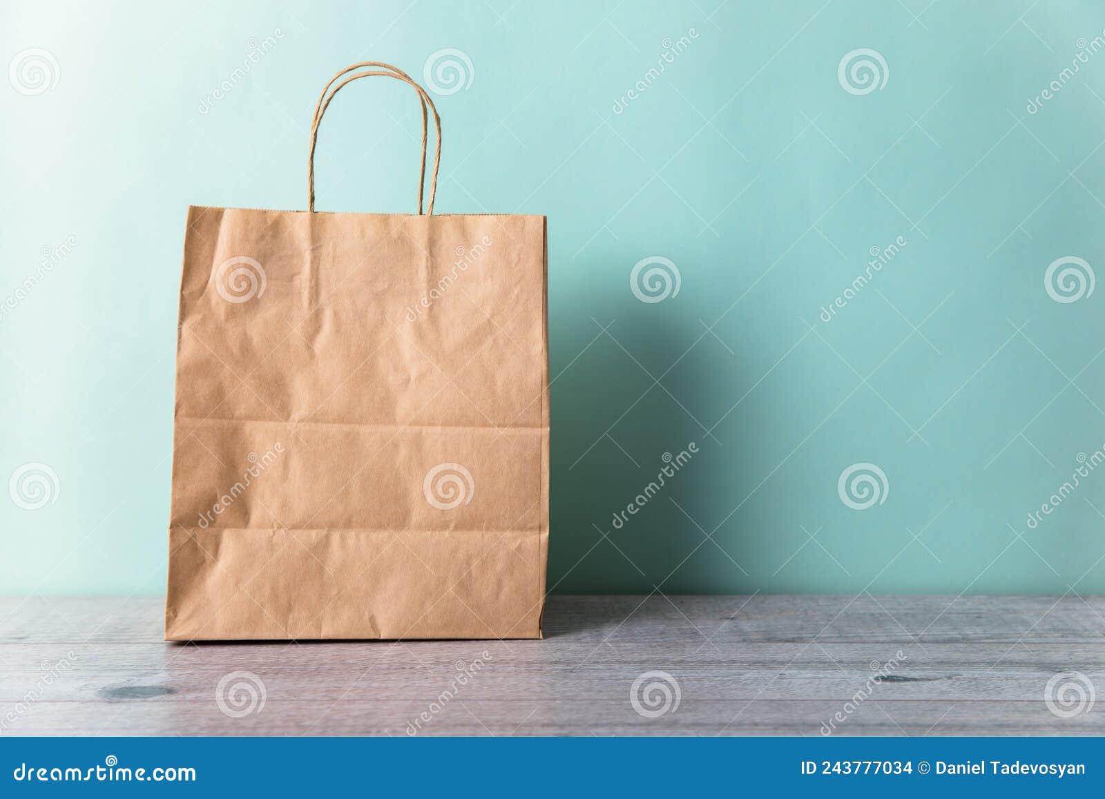 Shopping bag on the table stock photo. Image of shopping - 243777034