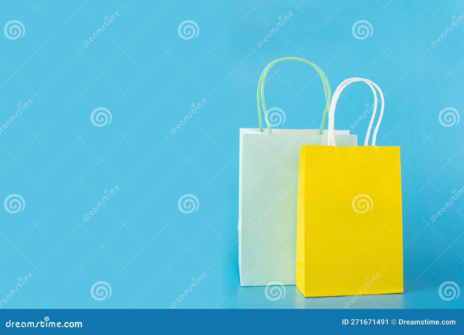 Shopping Bags on Blue Background, Shopping Delivery, Gift Bags Stock ...