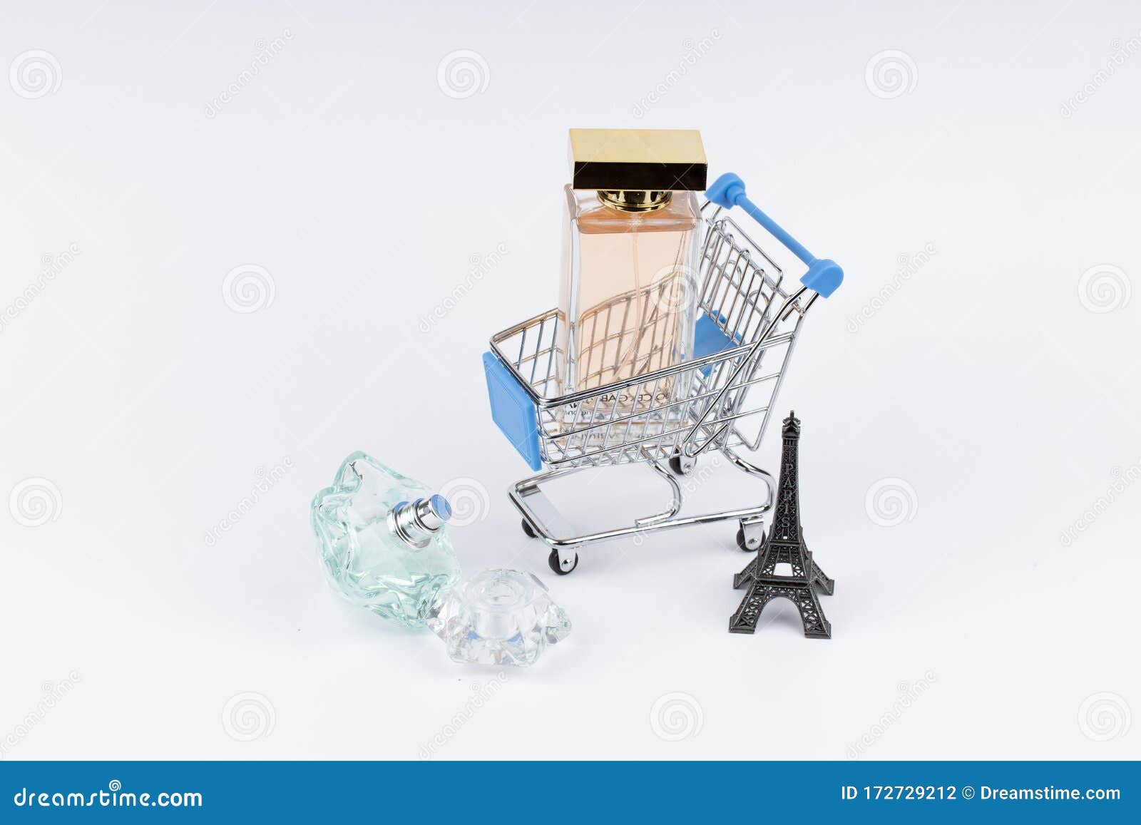 Shopping Cart with Perfume on White Background Stock Photo - Image of ...