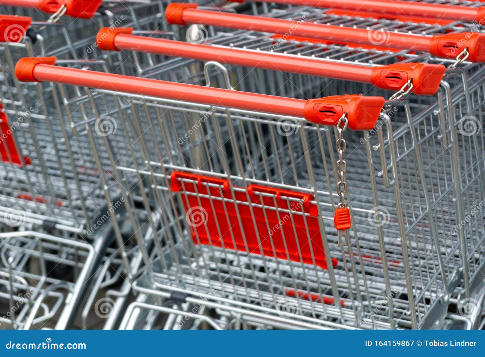 Shopping Carts - Handle with Lock Stock Image - Image of white, empty ...