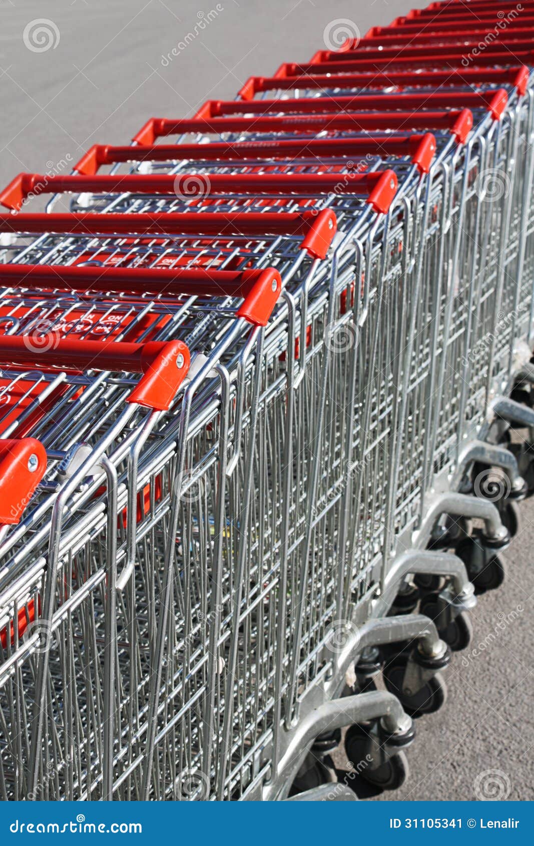 Shopping carts in rows stock image. Image of consumption - 31105341