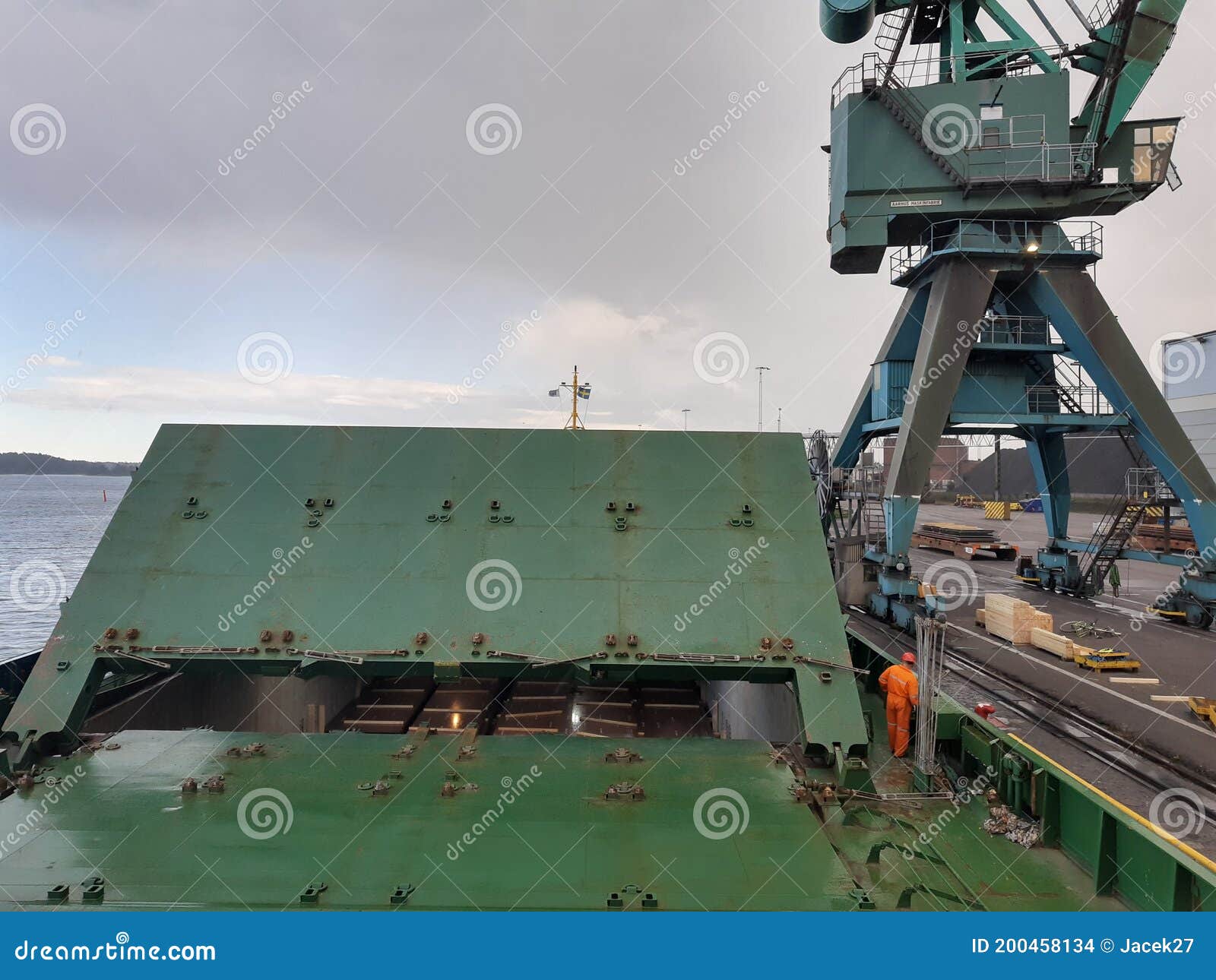 Shore Crane Loading Containers in Freight Ship. Stock Photo - Image of ...