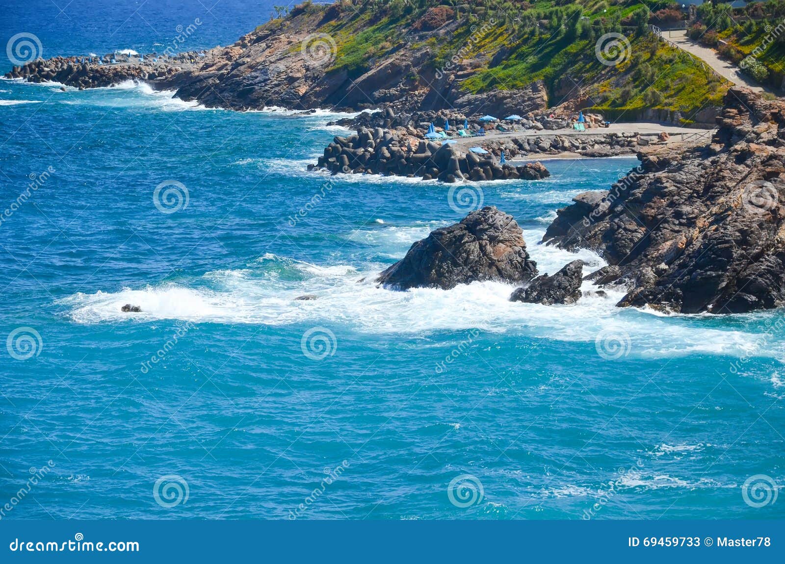 Shore meets the blue sea stock image. Image of greek - 69459733