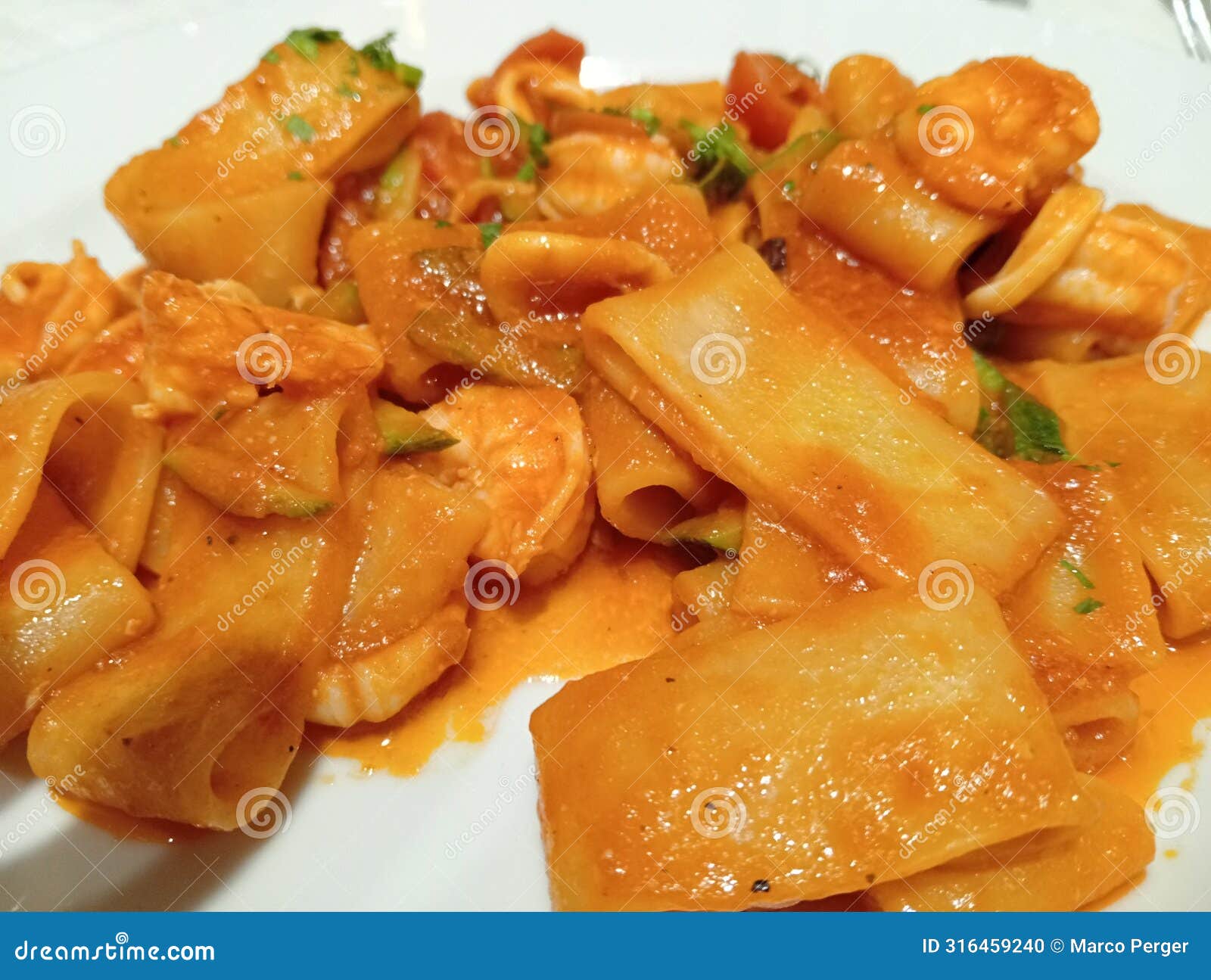Short Pasta Called Paccheri with Mixed Seafood Sauce Stock Photo ...