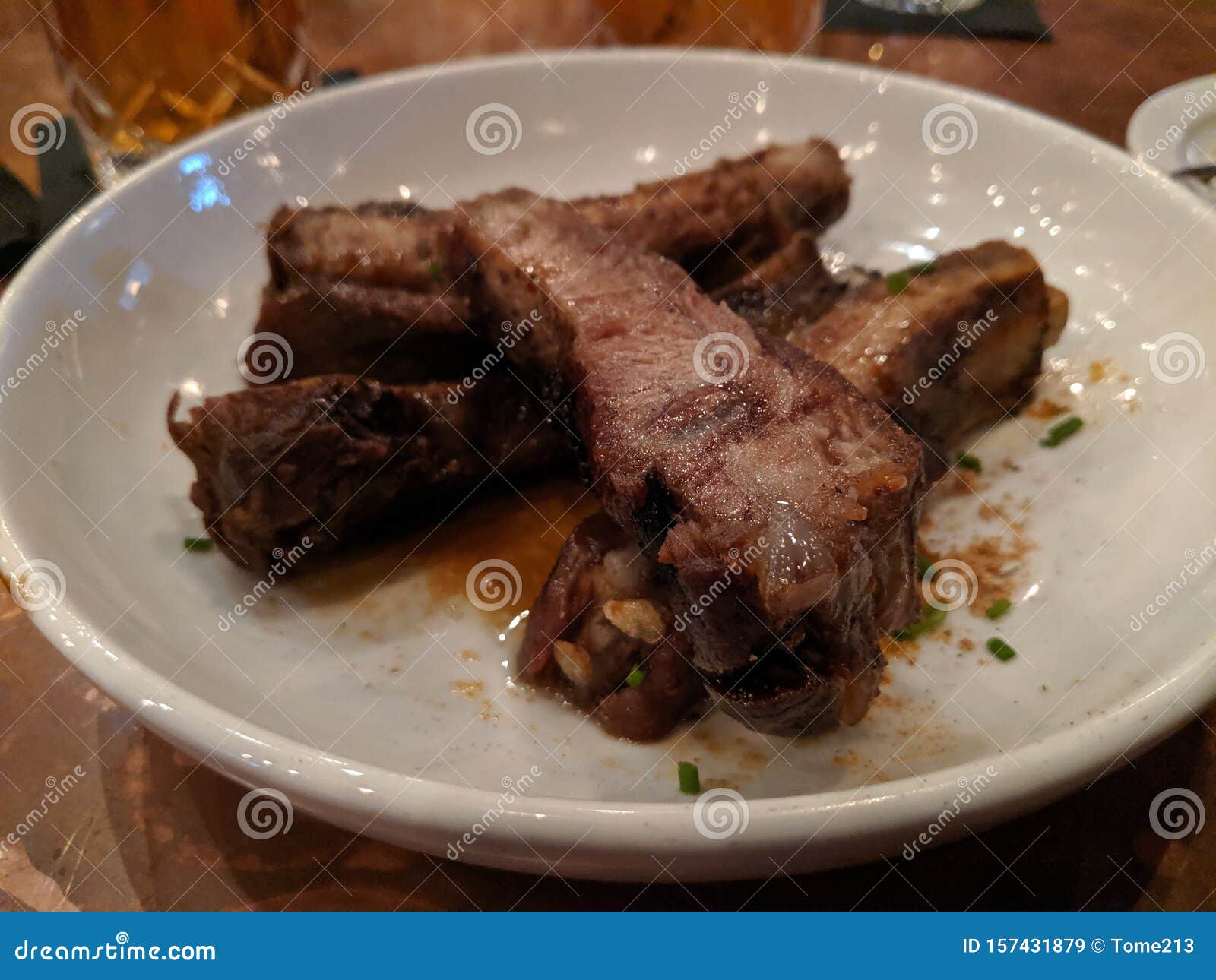 Short ribs on a plate stock image. Image of meal, restaurant - 157431879