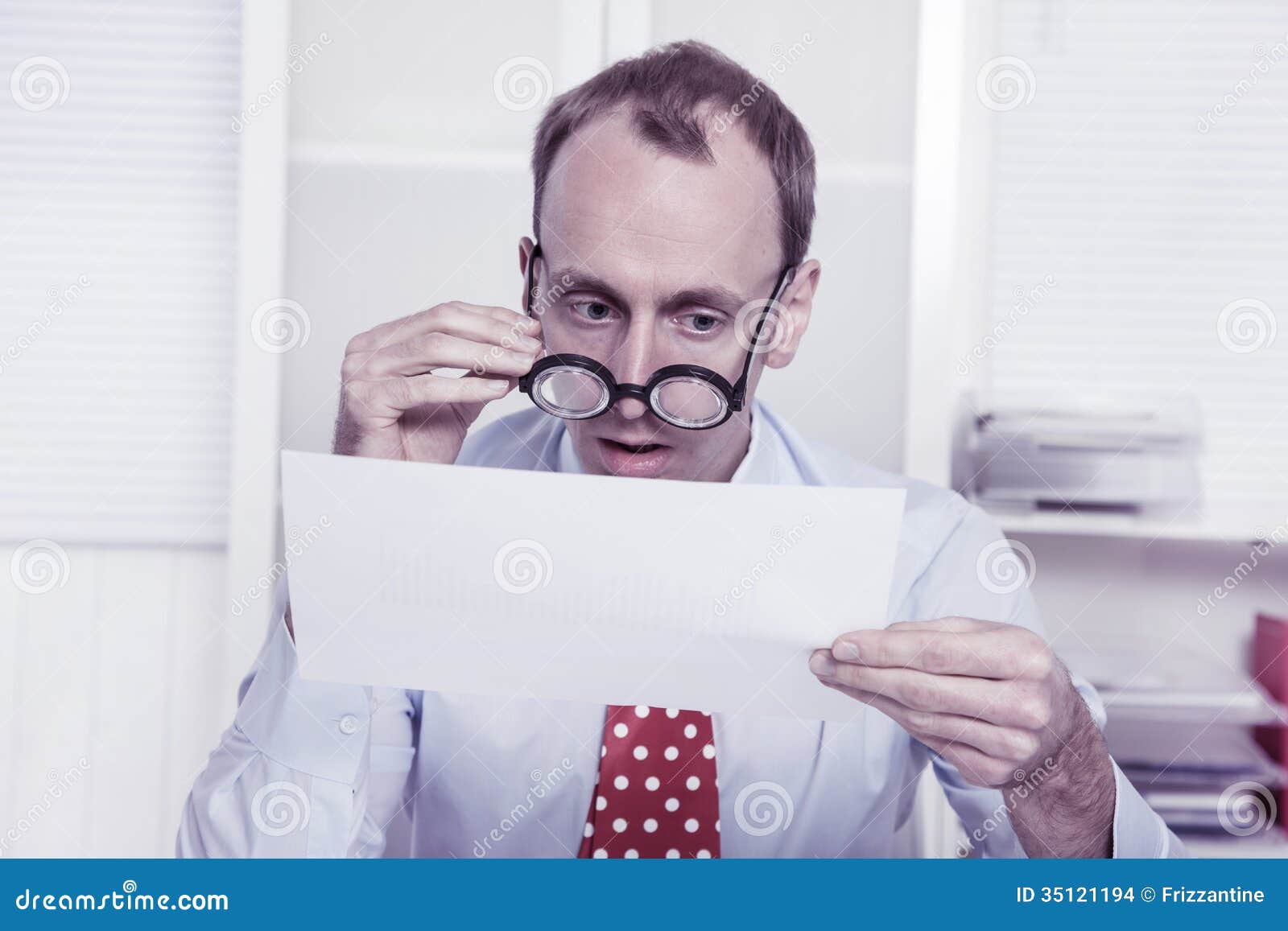 Short Sighted at Work - Balding Businessman Looking through Glasses at ...