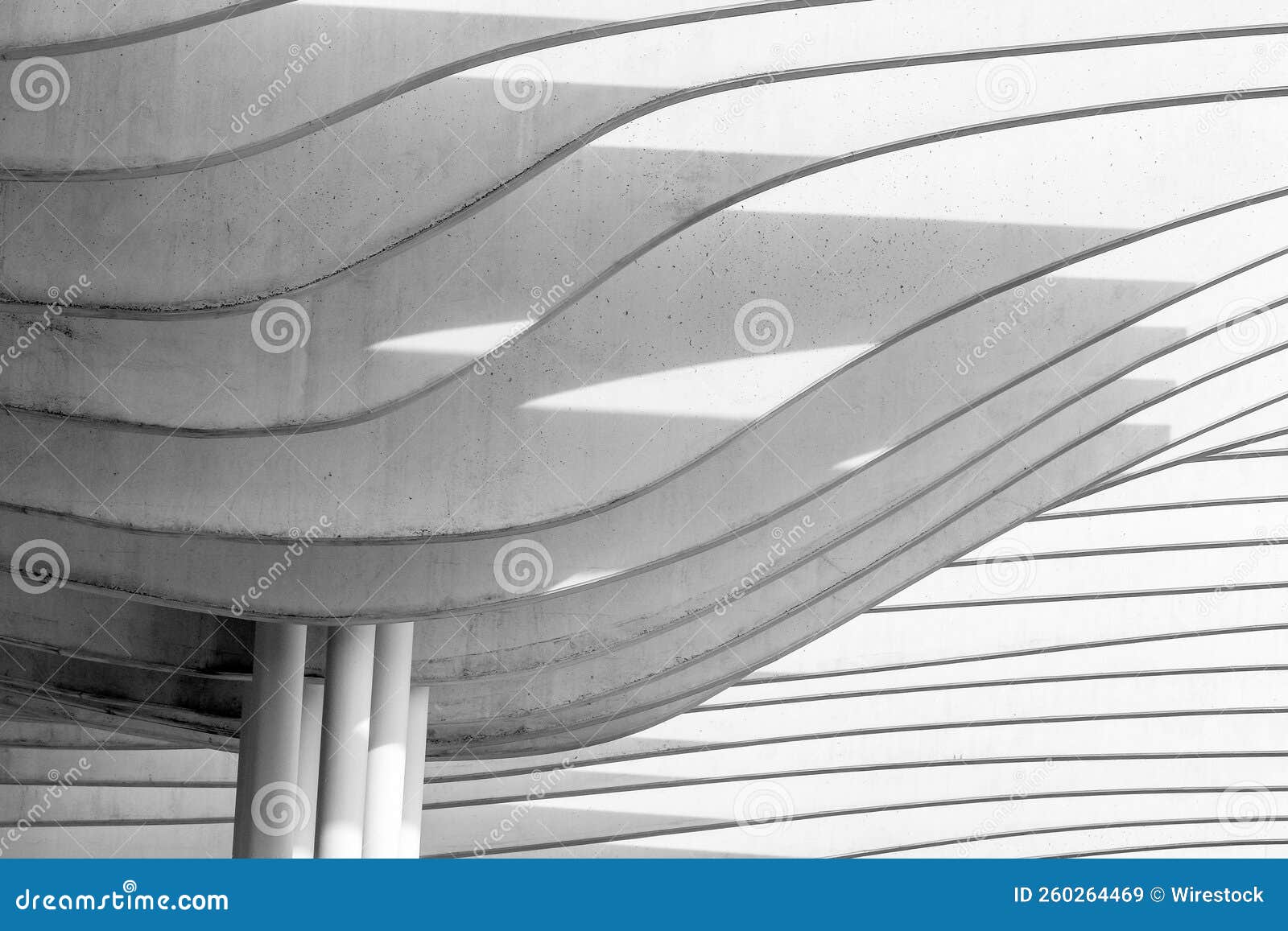 Shot of Architectural Wall Art with Pattern Lines Over White Poles ...