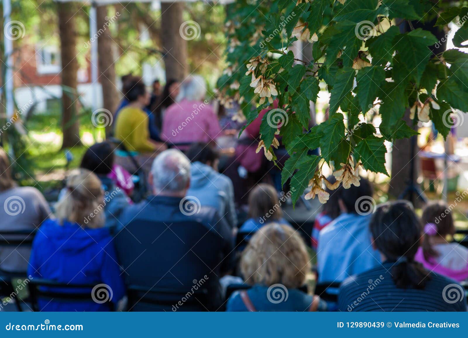 Group of Singers Form a Circle on the Stage while Singing Native ...