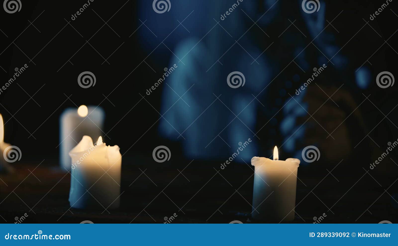 Shot Capturing a Table with Magical Tools on it. a Priest is Sitting at ...