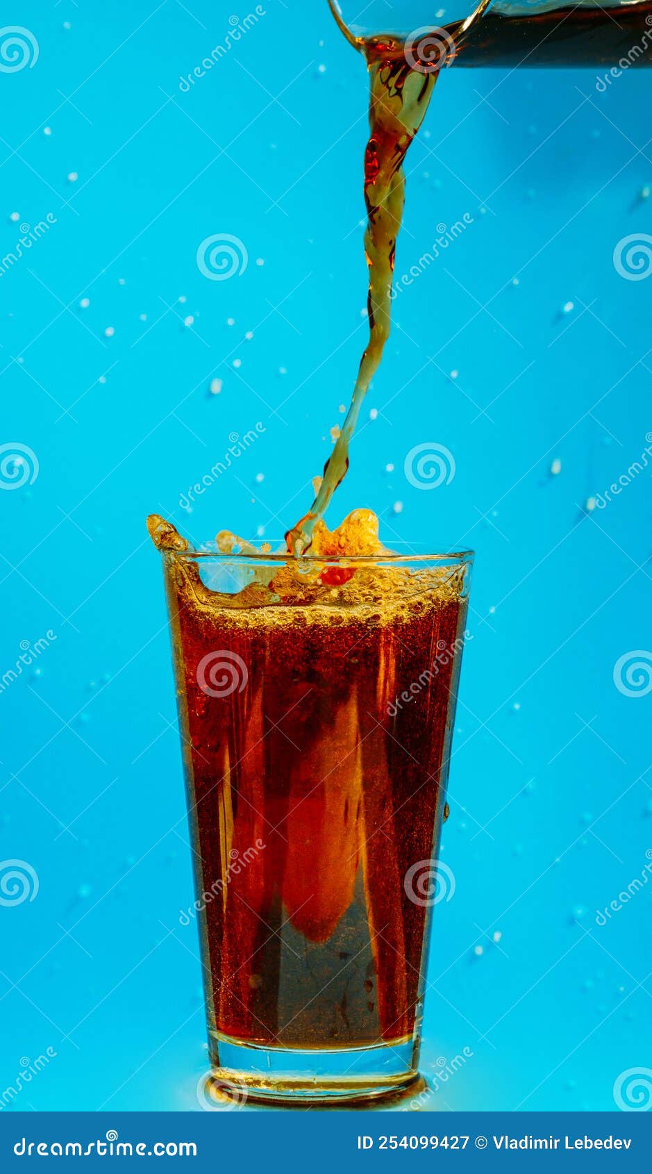 Cola is Poured into a Glass, Splashing Around Stock Image - Image of ...