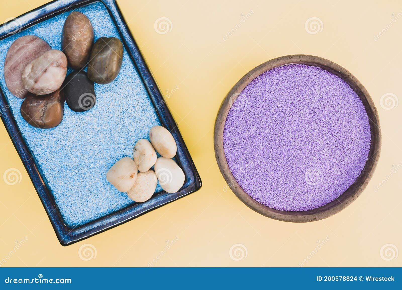 Shot of Colored Sand in Bowls with Some Natural Stones Stock Photo ...