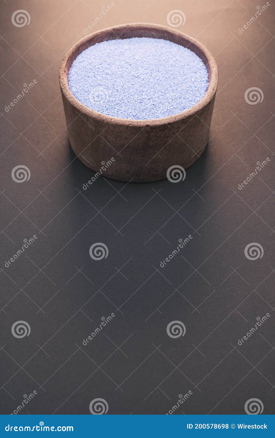 Shot of Colored Violet Sand in a Bowl Stock Photo - Image of vertical ...