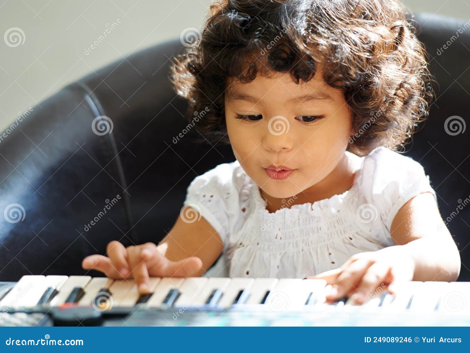 Learning As she Grows. Shot of a Cute Little Girl at Home. Stock Photo ...