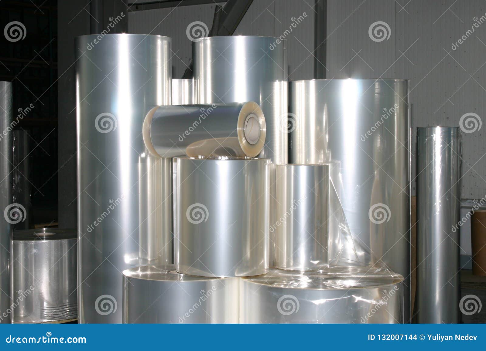 A Shot of Different Sized Plastic Foil Rolls Stock Photo - Image of ...