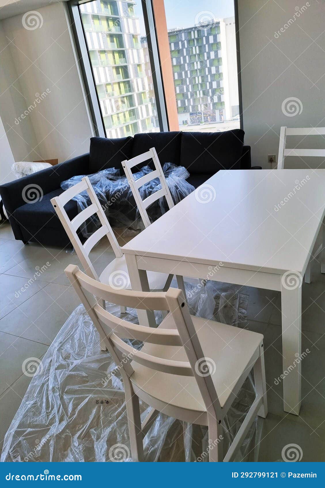 Shot of the Dining Table Set Just Assembled in the Room. Interior Stock ...