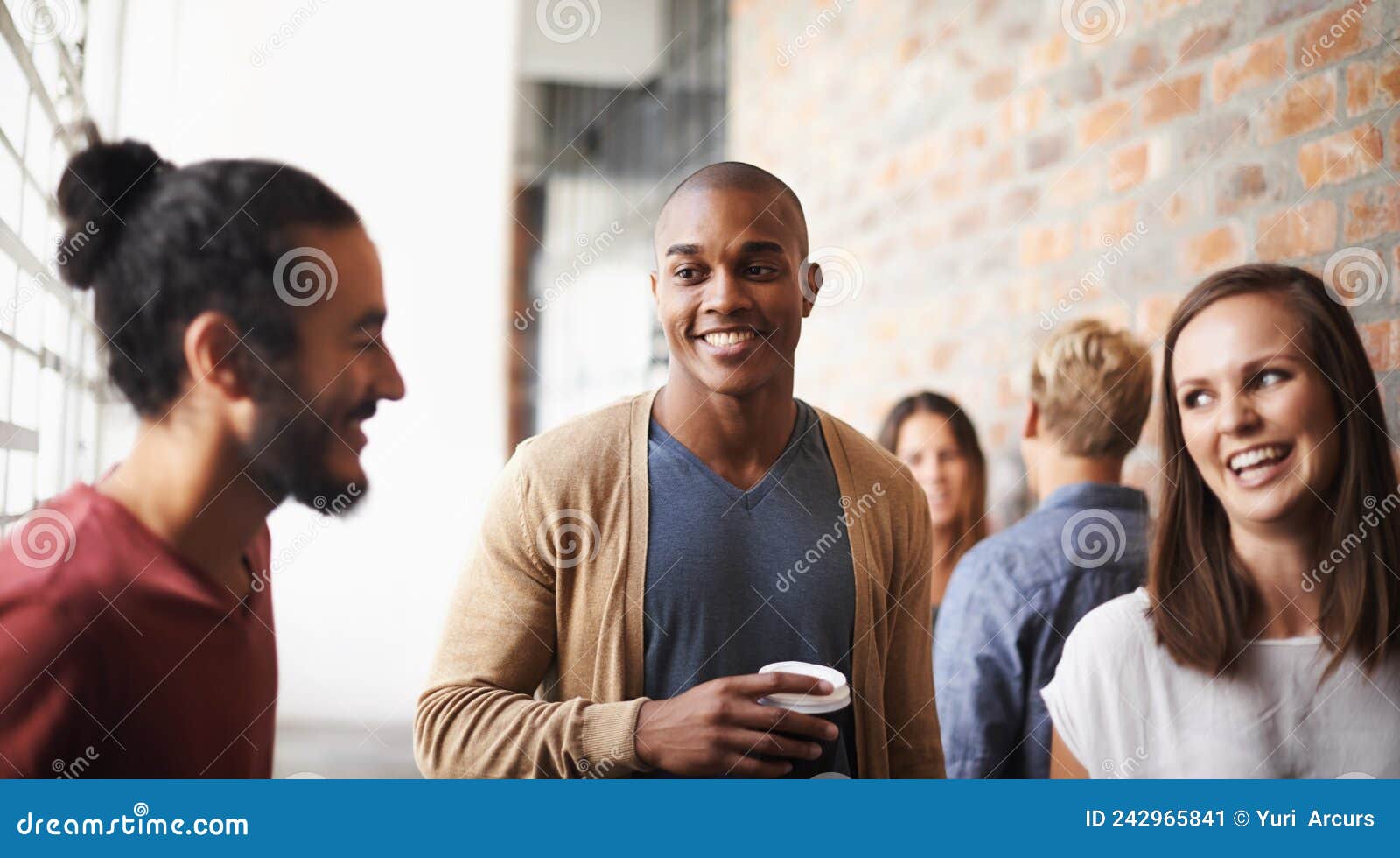 Taking a Quick Break before Getting Back To Work. Shot of a Diverse ...