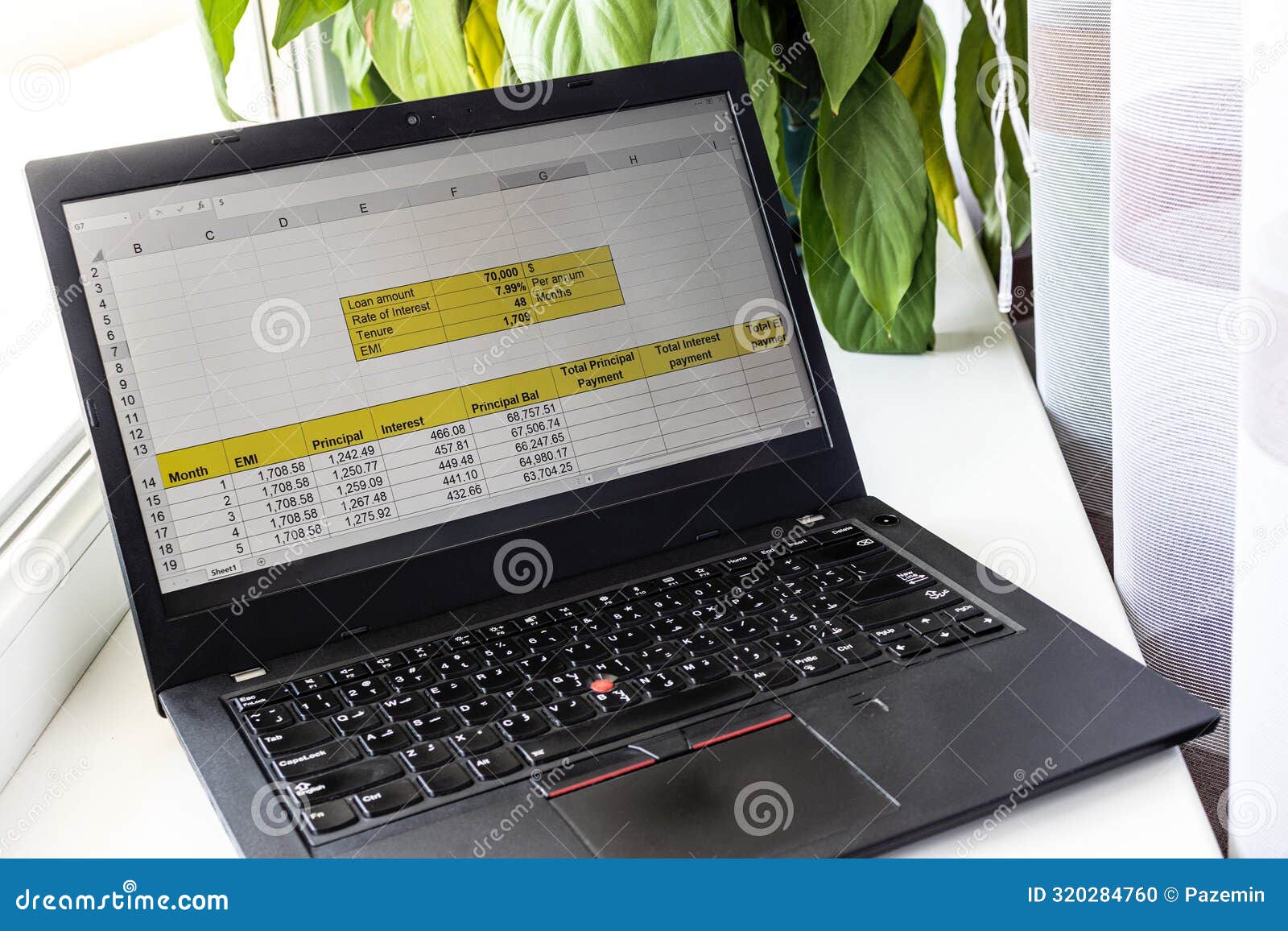 Shot of an Excel Sheet on Computer Screen Showing Bank Loan ...