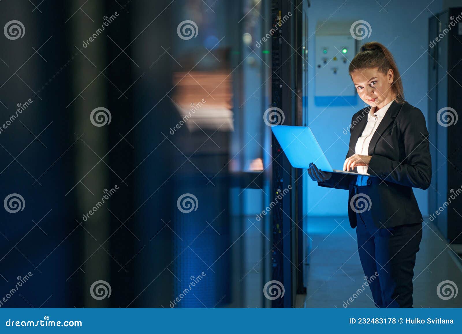 Attractive Female Employee Working in Internet Server Room Stock Photo ...
