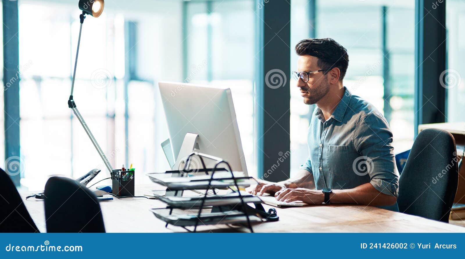 The Successful Stay Consistent. Shot of a Focused Young Businessman ...