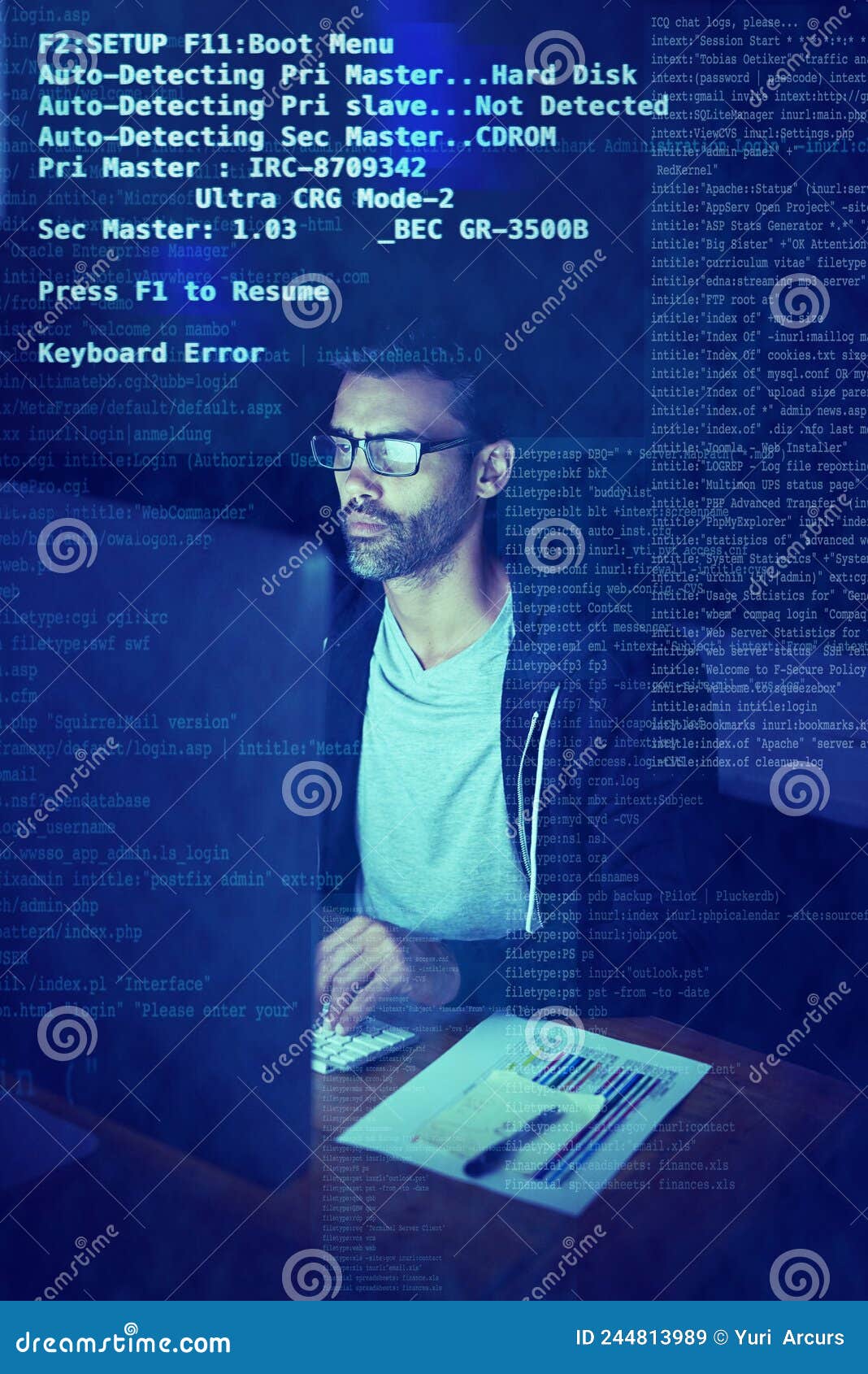 Hacking Is A Serious Business Shot Of A Focussed Computer Hacker Using