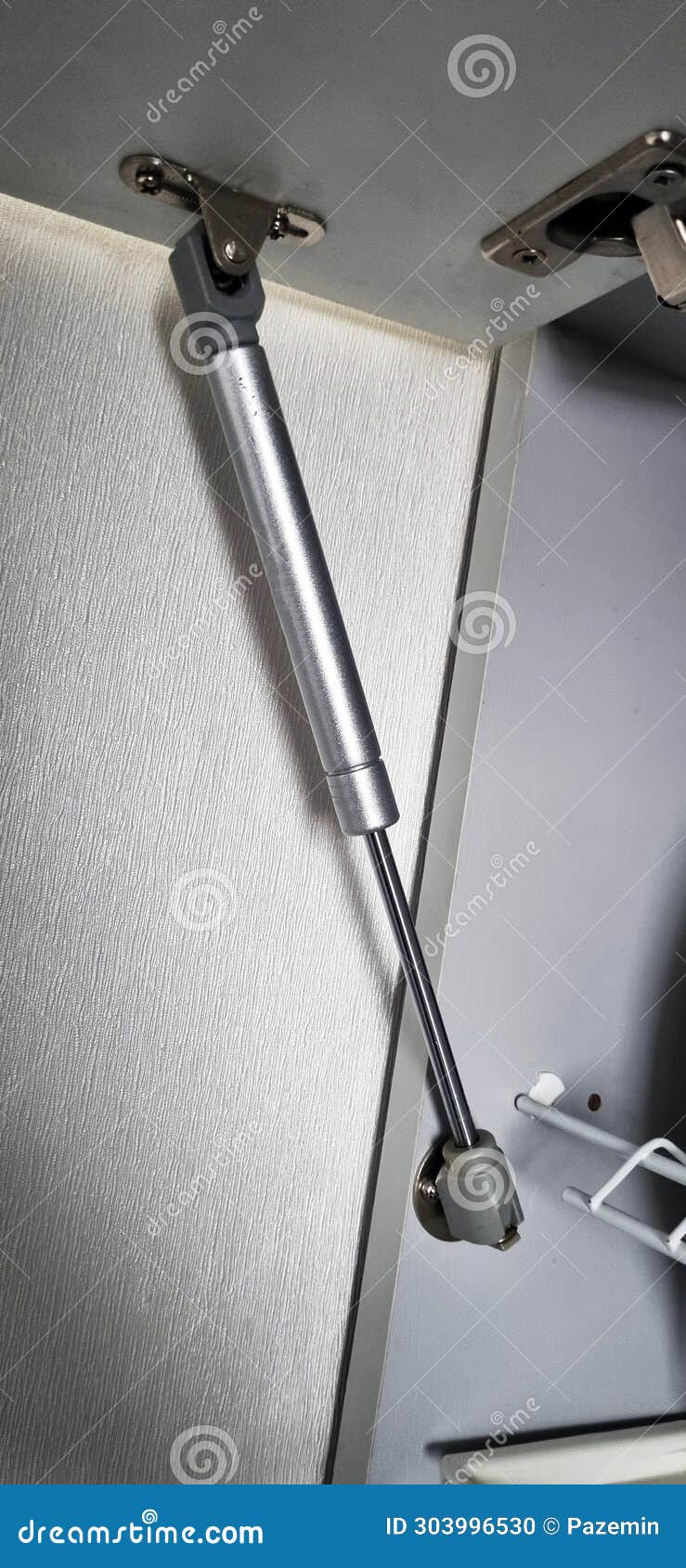 Shot of the Gas Strut for Kitchen Cabinet. Interior Stock Photo - Image ...