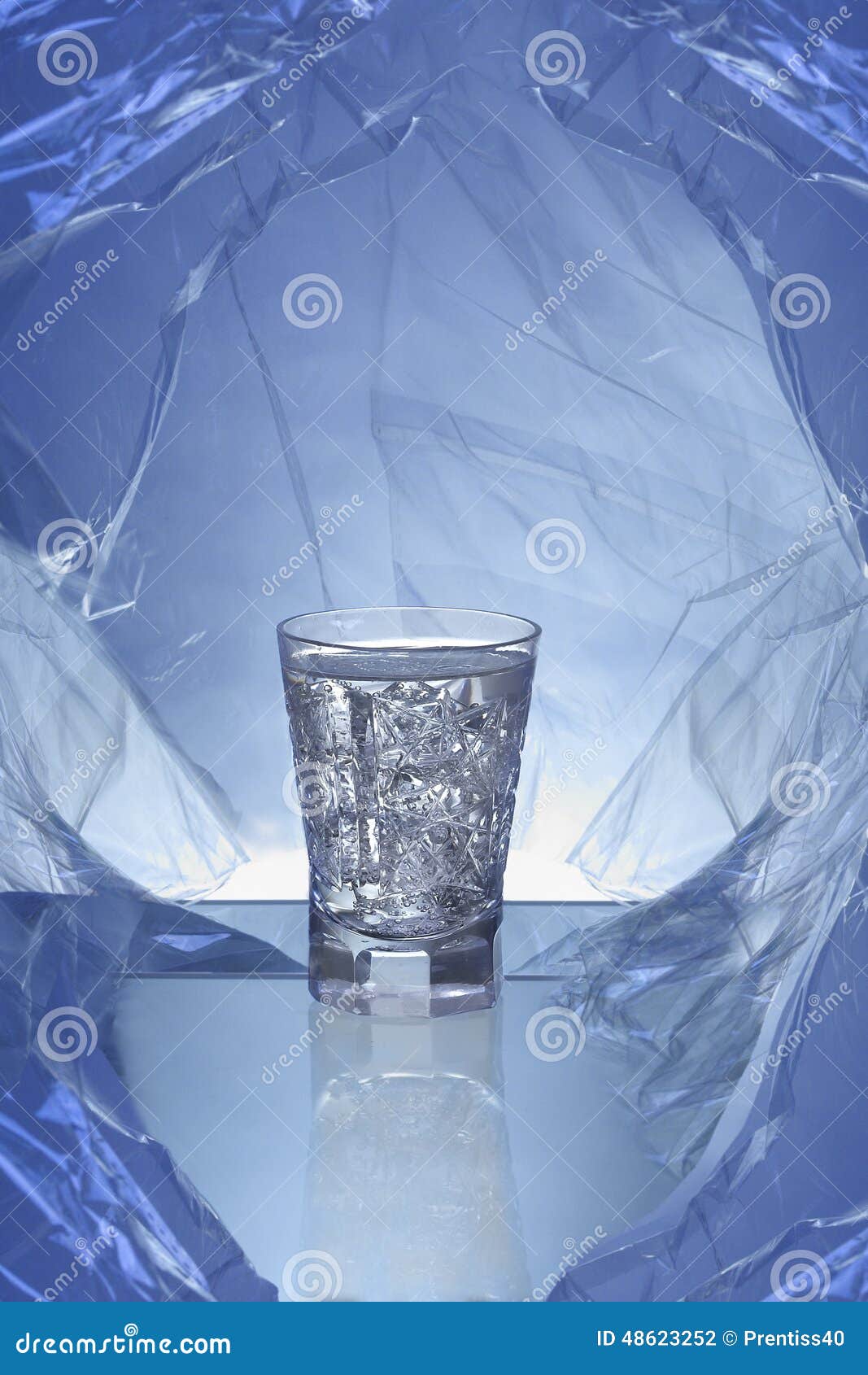 Shot of Gin in ice rock stock photo. Image of blue, tonic - 48623252