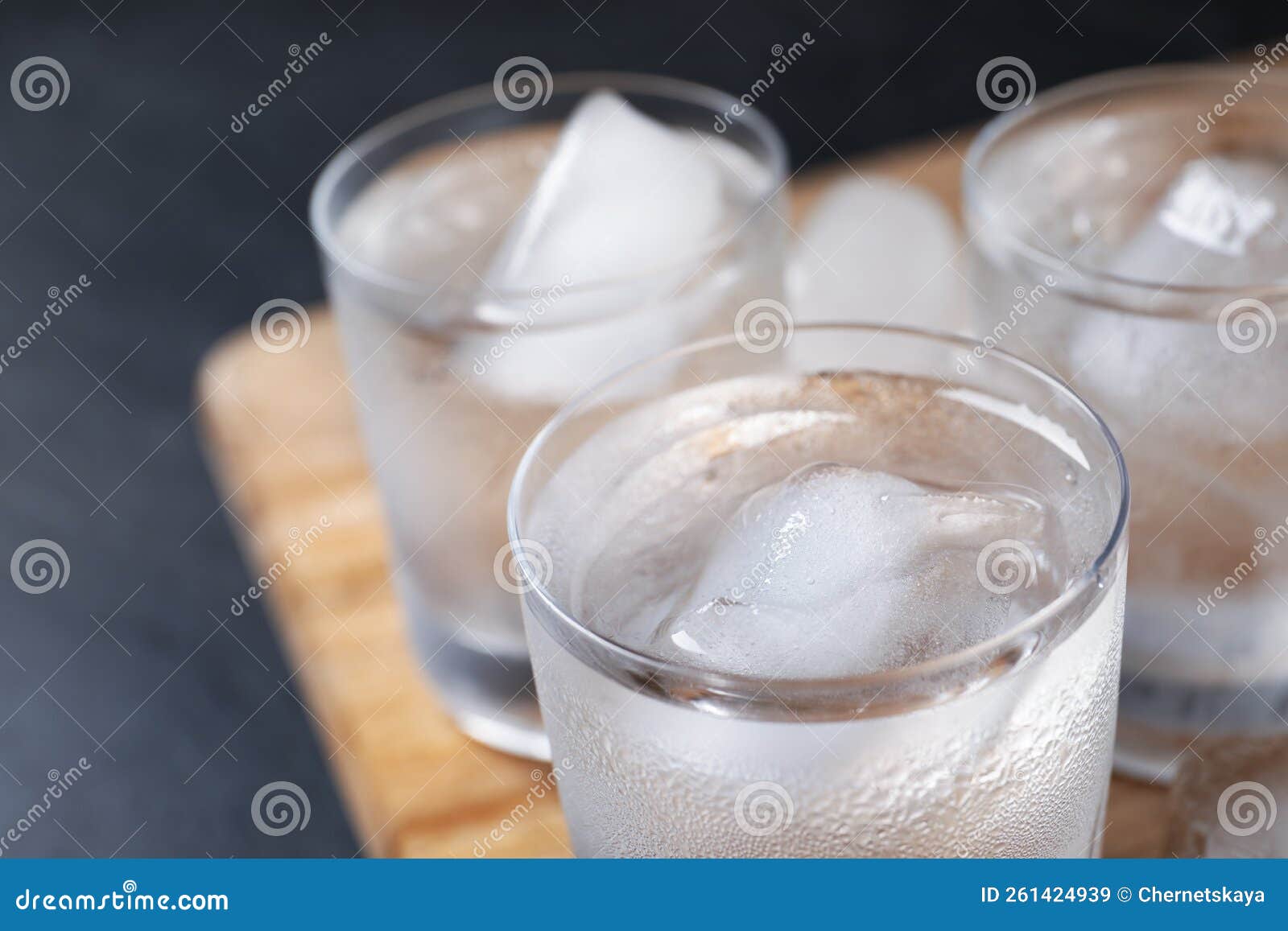 Shot Glasses of Vodka with Ice Cubes on Table, Closeup Stock Image ...