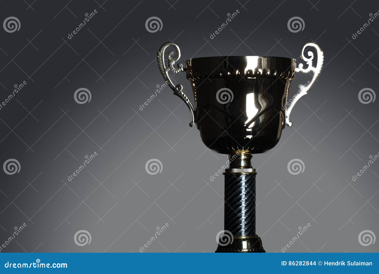 Shot of Gold Award Trophy in Gray Background Stock Photo - Image of ...