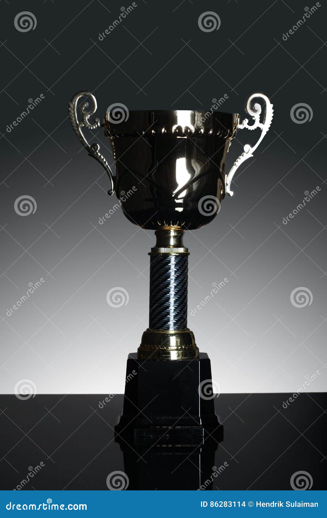 Shot of Gold Award Trophy in Gray Background Stock Photo - Image of ...