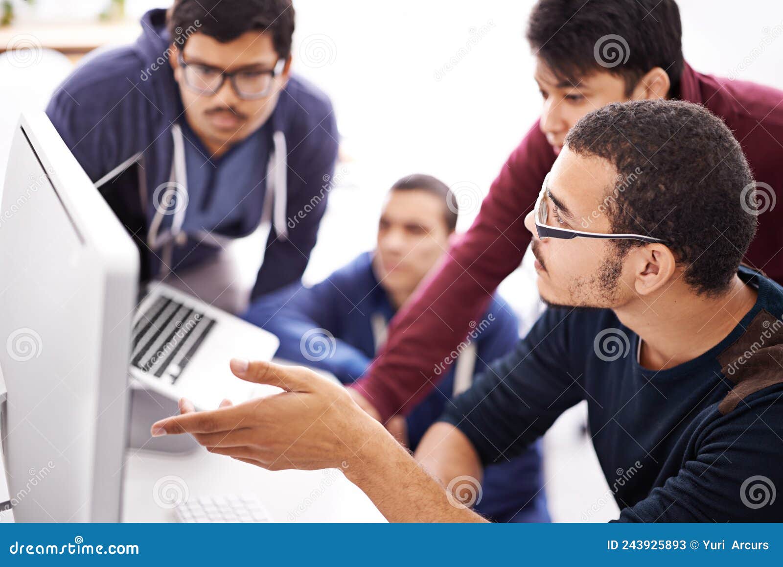 Collaborative Coding. Shot of a Group of Colleagues Working Together ...