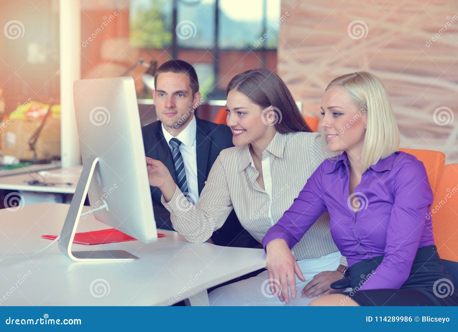 Group of Colleagues Working Together in an Office Stock Photo - Image ...