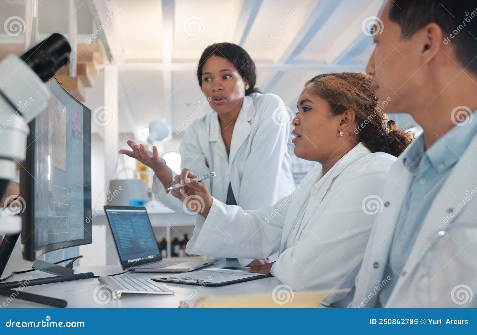 Bringing the Fields Most Interesting Minds Together. Shot of a Group of ...