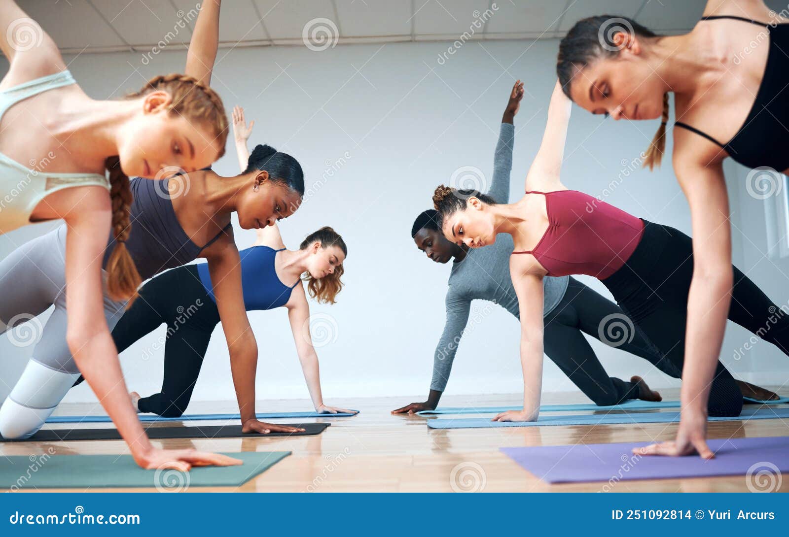 Stay Focused Calm and Serene. Shot of a Group of Students Performing ...