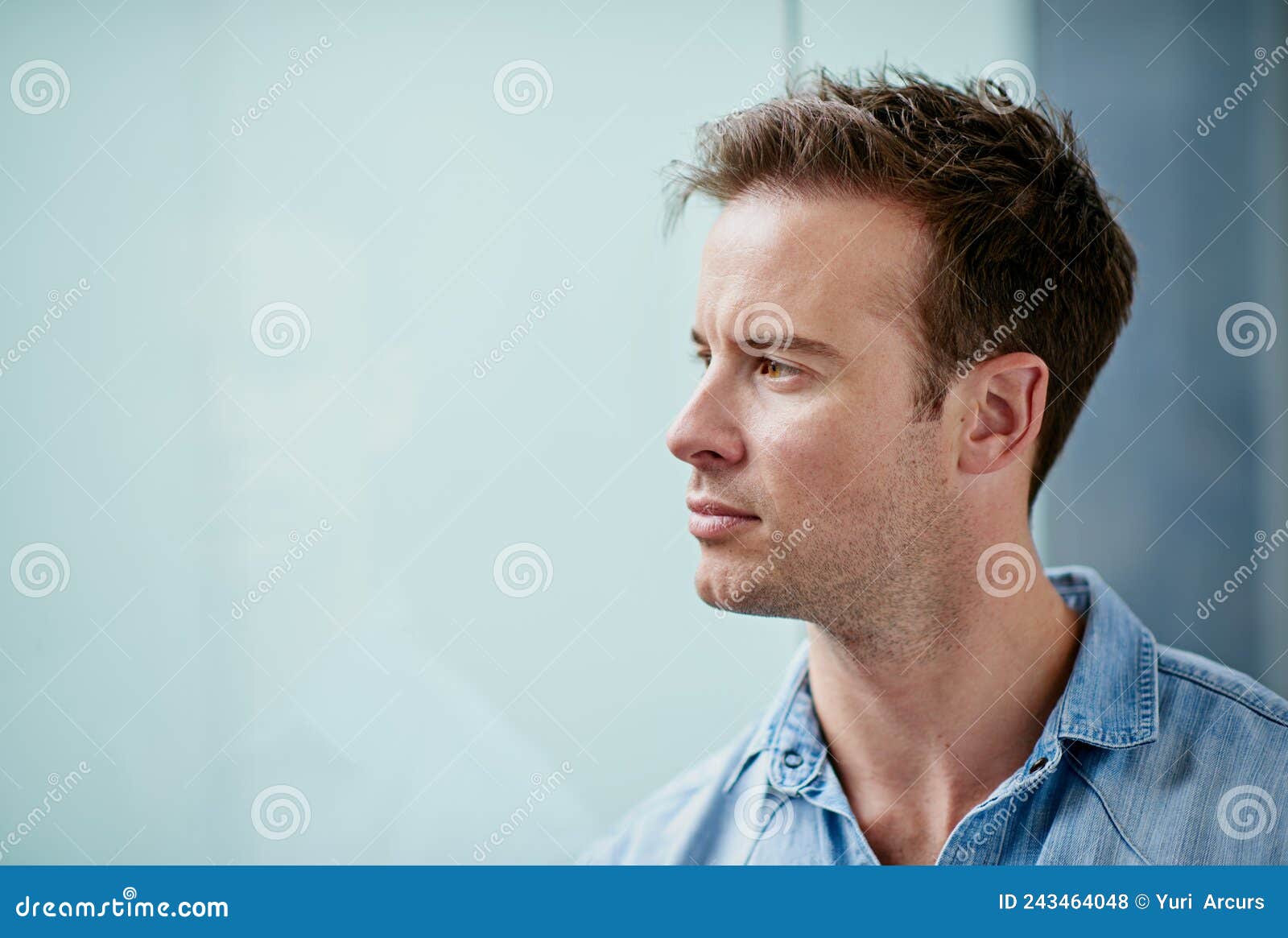 Focused on the Future. Shot of a Handsome Young Man Looking Thoughtful ...