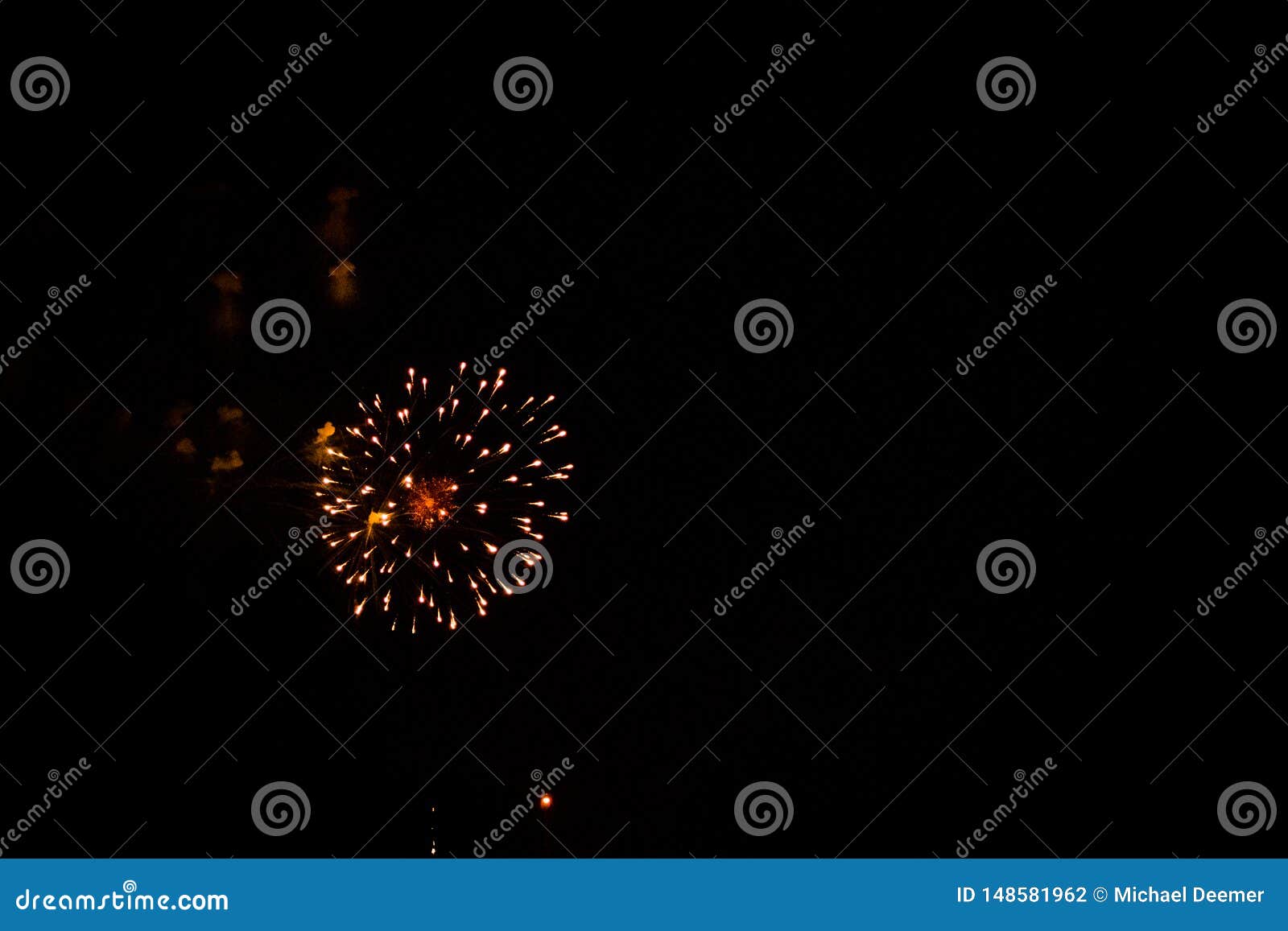 Shot of an Isolated Firework in the Night Sky during the 4th of July ...