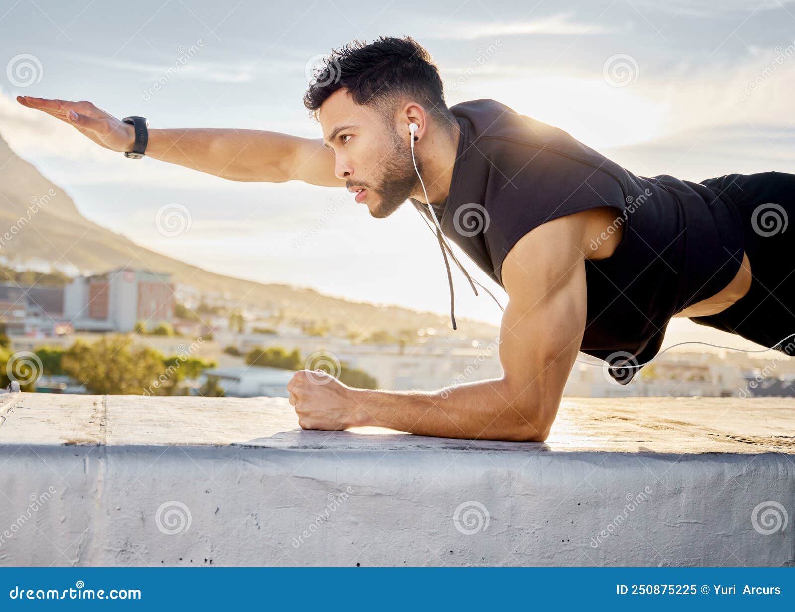 Just Keep Pushing Forward. Shot of a Man Doing a Single-arm Plank while ...