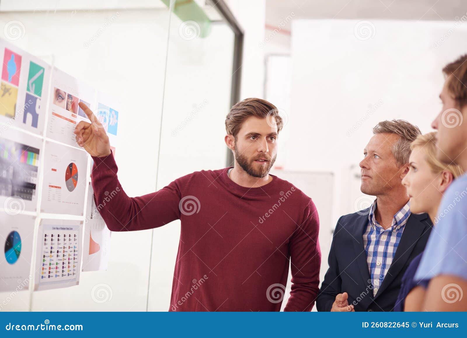 Find a Way or Make One. Shot of a Man Presenting Data To His Colleagues ...