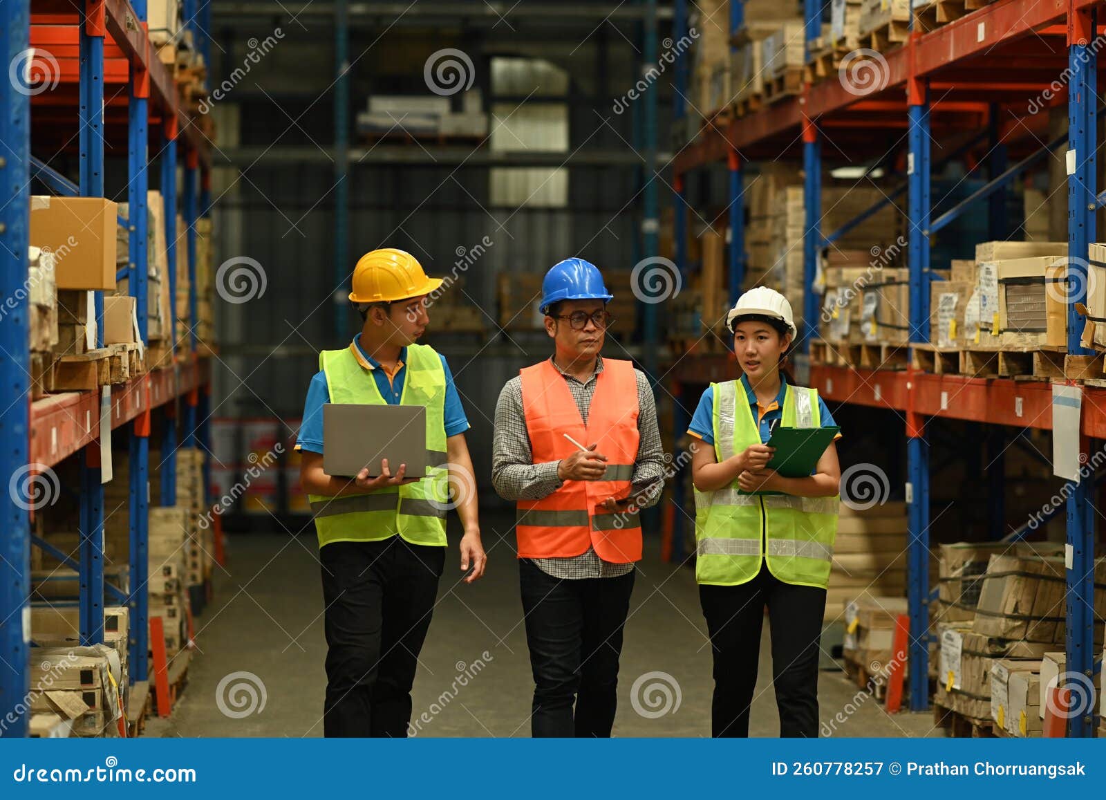 Shot of Manager and Young Workers Checking Quantity of Storage Product ...