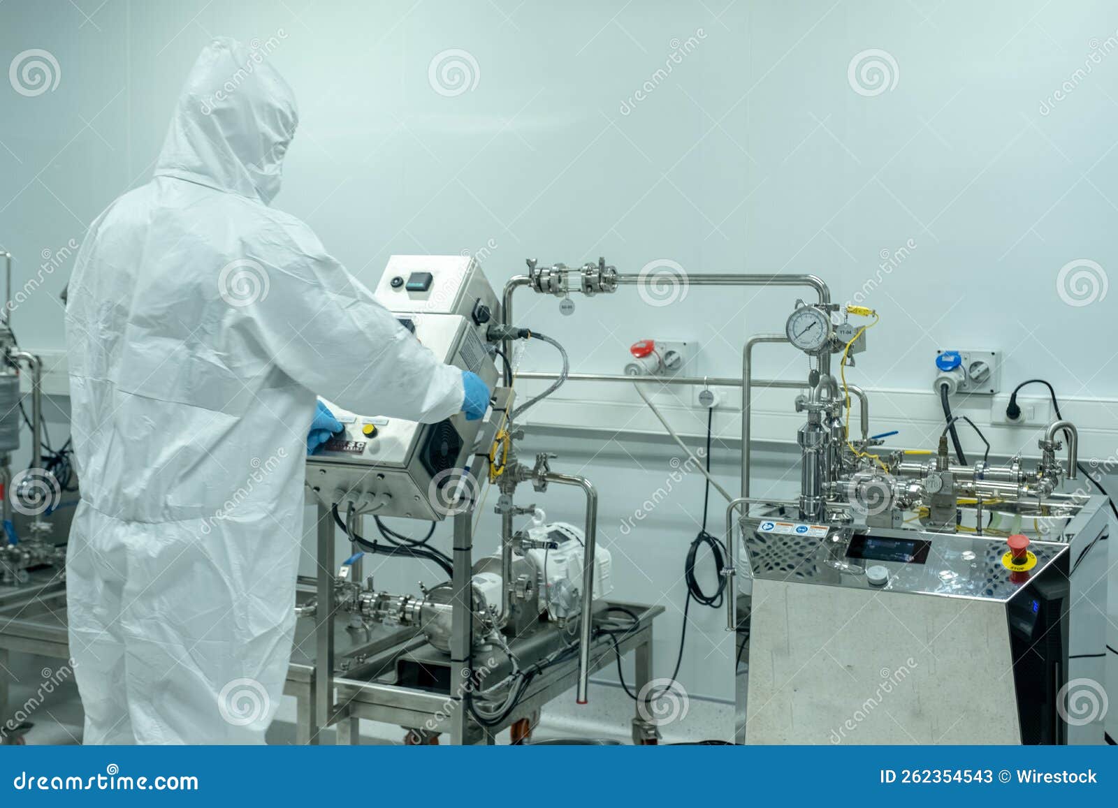 Shot of a Medic Working on a Scientific Machine with Wires, Pipes ...
