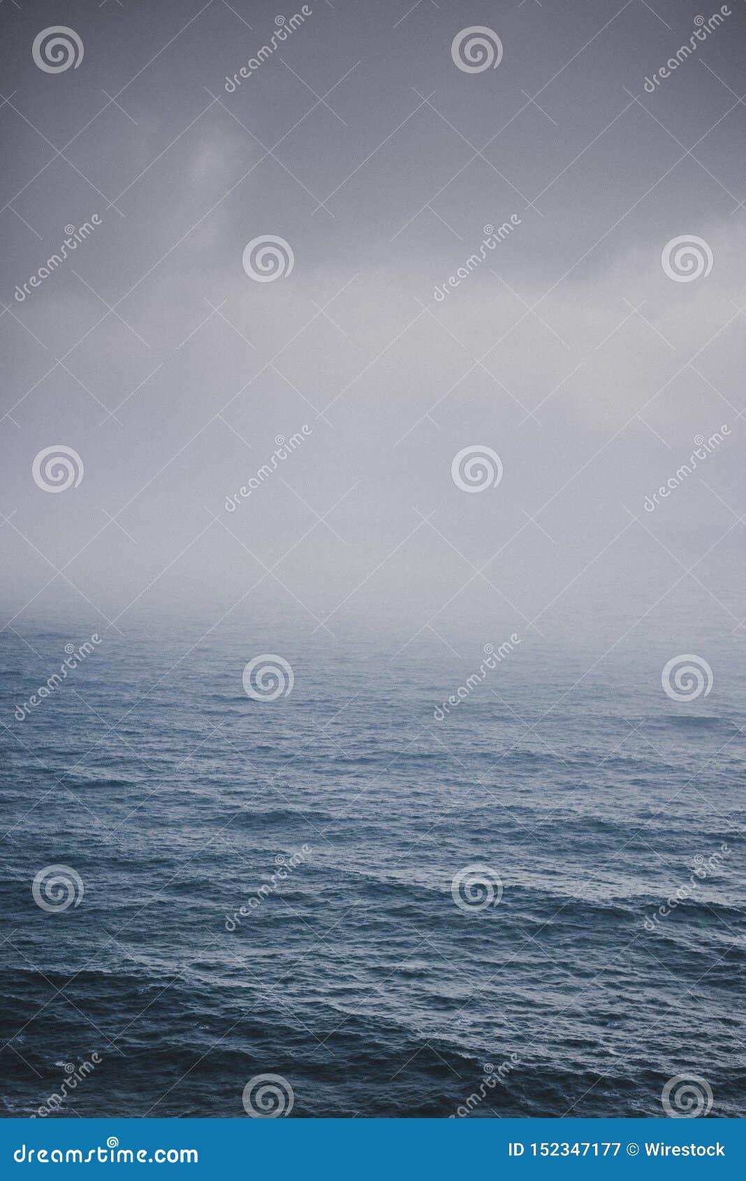Shot of the Ocean on a Foggy Day Stock Image - Image of mountains ...